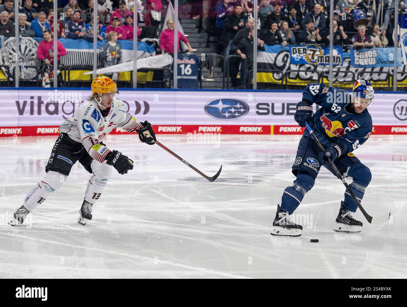 Muenchen, Deutschland. 10th Jan, 2025. Kampf um den Puck/Zweikampf zwischen Ziga Jeglic ...