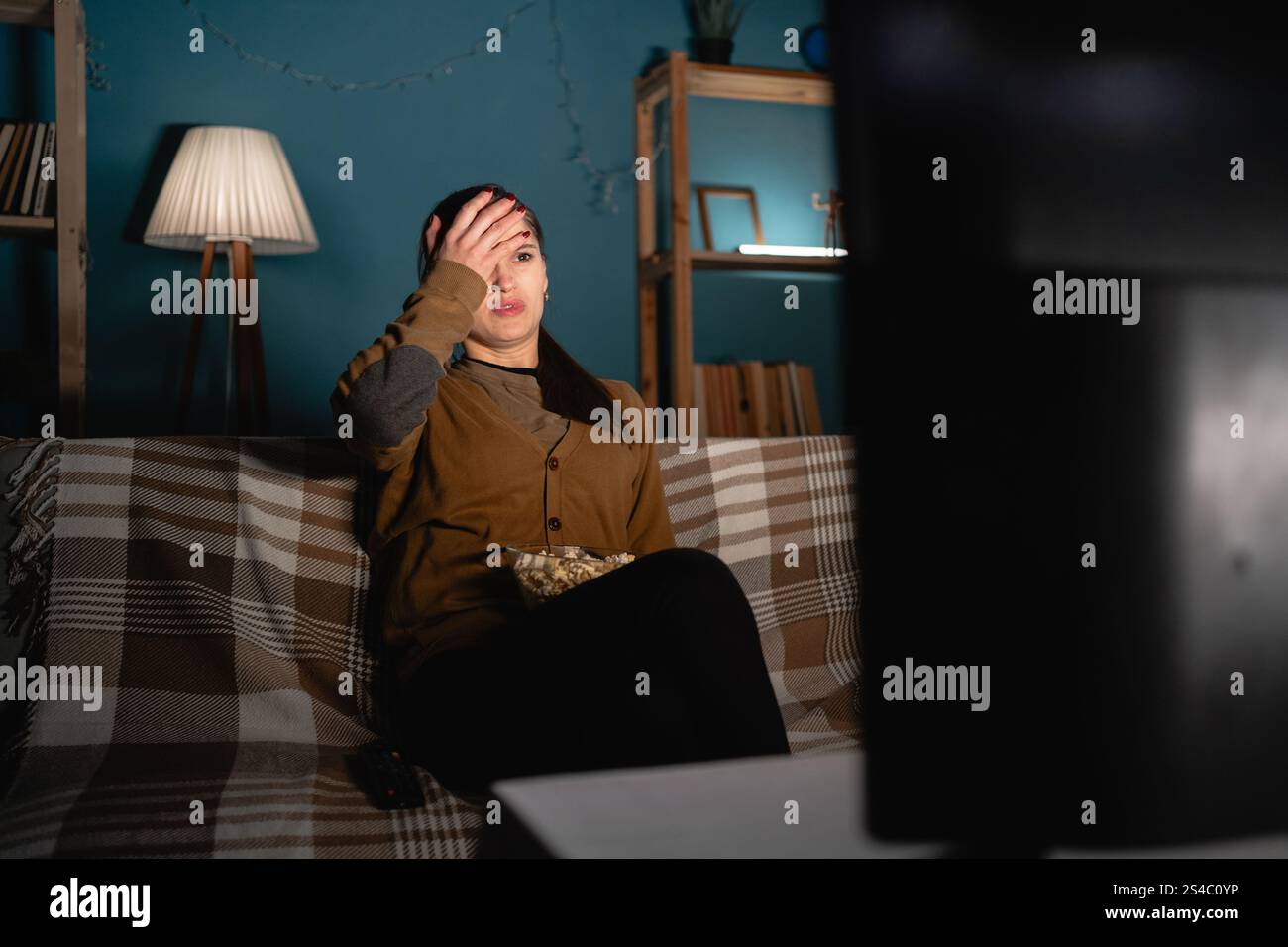 Female hand tv remote unhappy hi-res stock photography and images - Alamy