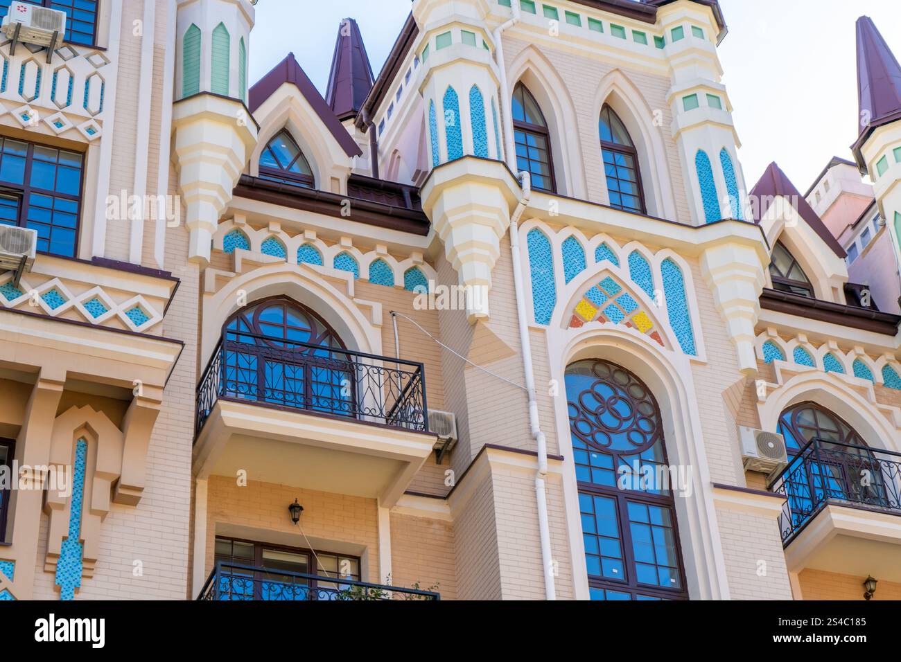Facade of Colorful Houses. Residential buildings. Bright windows ...