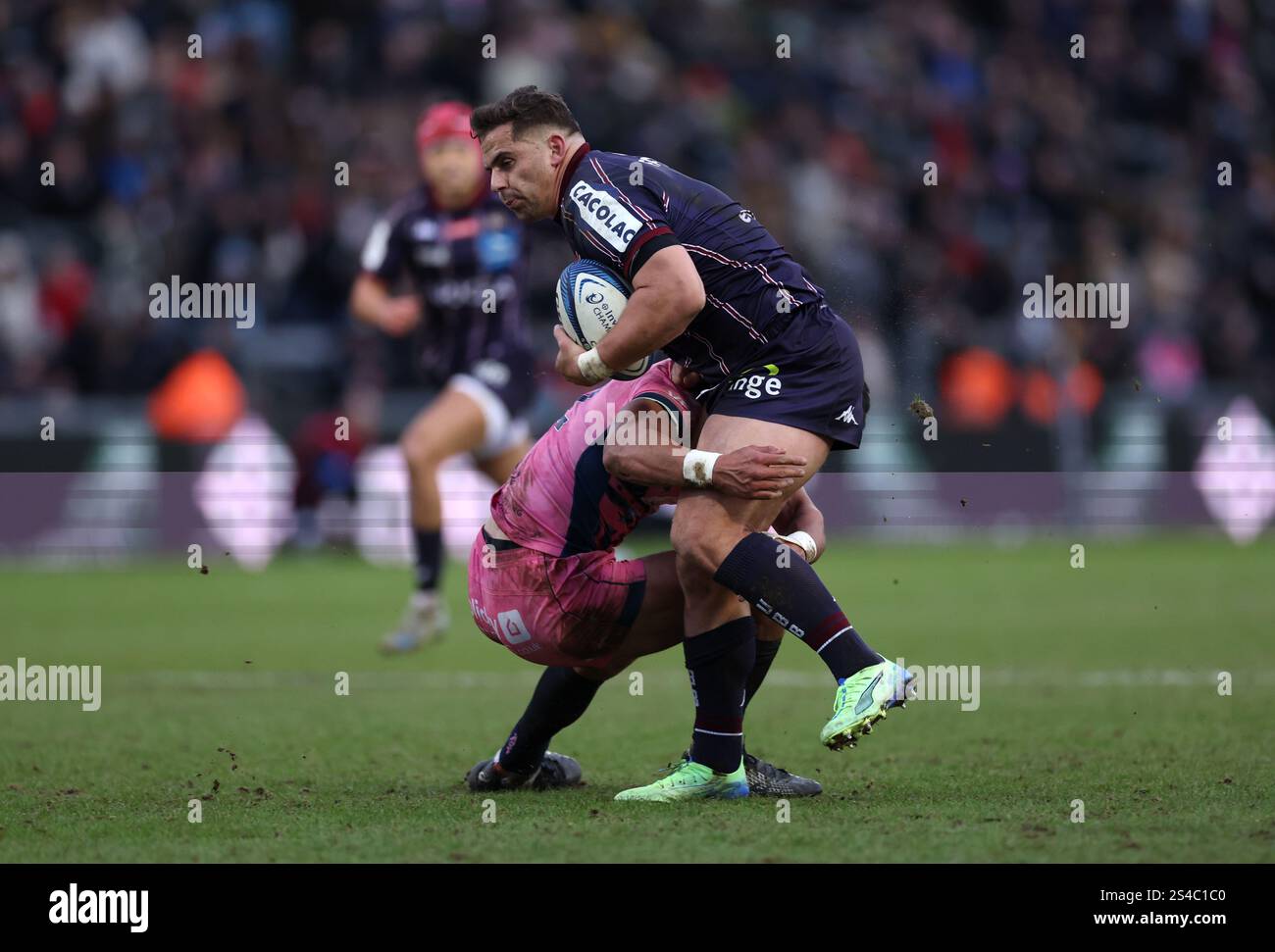 Bordeaux Begles' Rohan Janse van Rensburg tackled by Exeter Chiefs ...