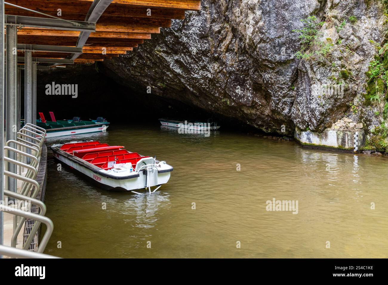 Tourist boats await visitors at the entrance of Punkva Caves in ...