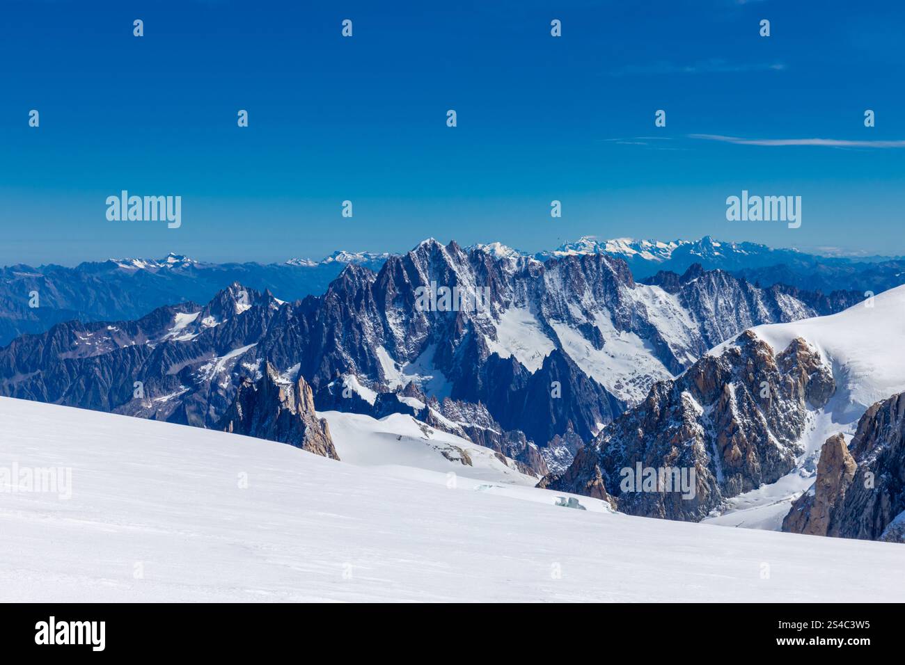 Snow mountain summits and white ice glacier in the Alps. Mont Blanc climbing route and views ...