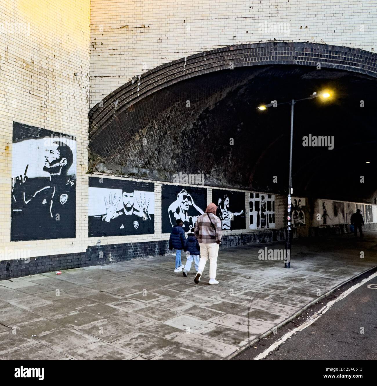 Graffiti by a street artist (Northbanksy on X) of Arsenal players on ...