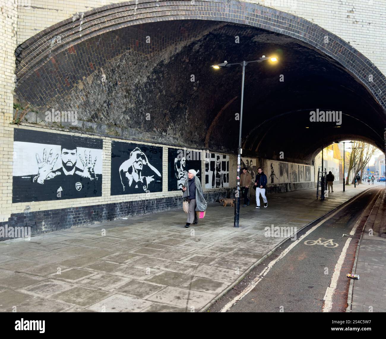 Graffiti by a street artist (Northbanksy on X) of Arsenal players on ...