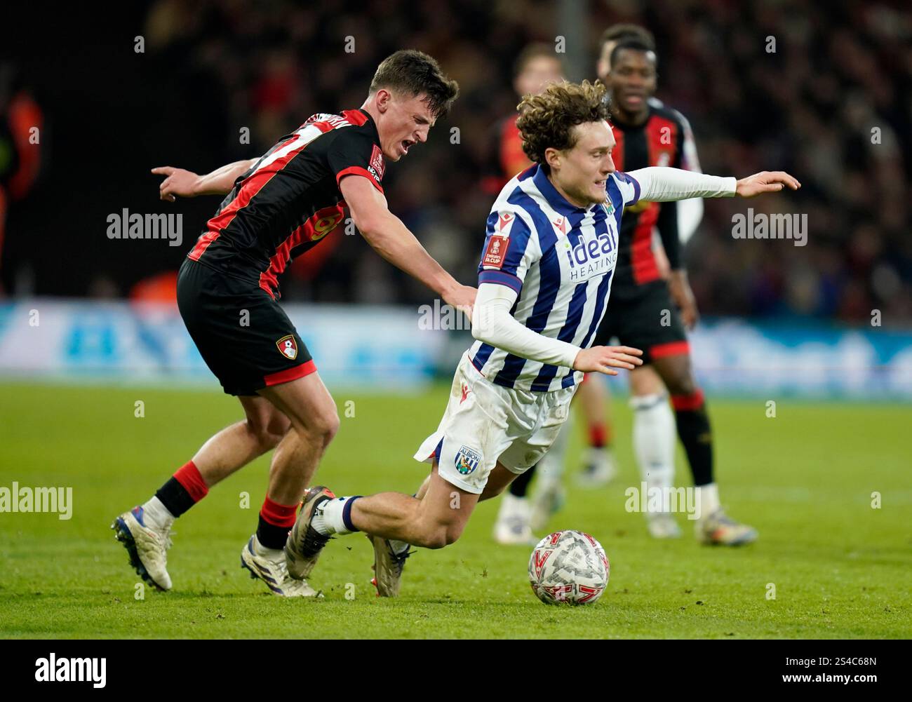 Bournemouth's Ben Winterburn (left) fouls West Bromwich Albion's Callum ...