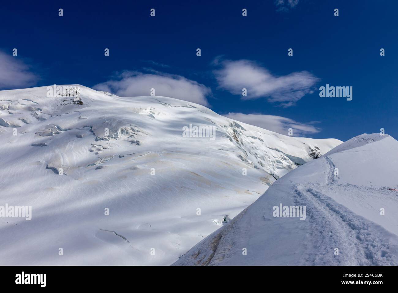 Snow mountain summits and white ice glacier in the Alps. Mont Blanc ...