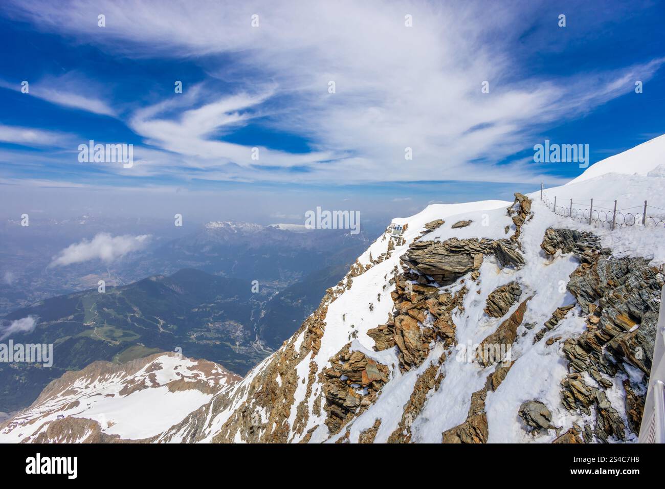 Snow mountain summits and white ice glacier in the Alps. Mont Blanc climbing route and views ...