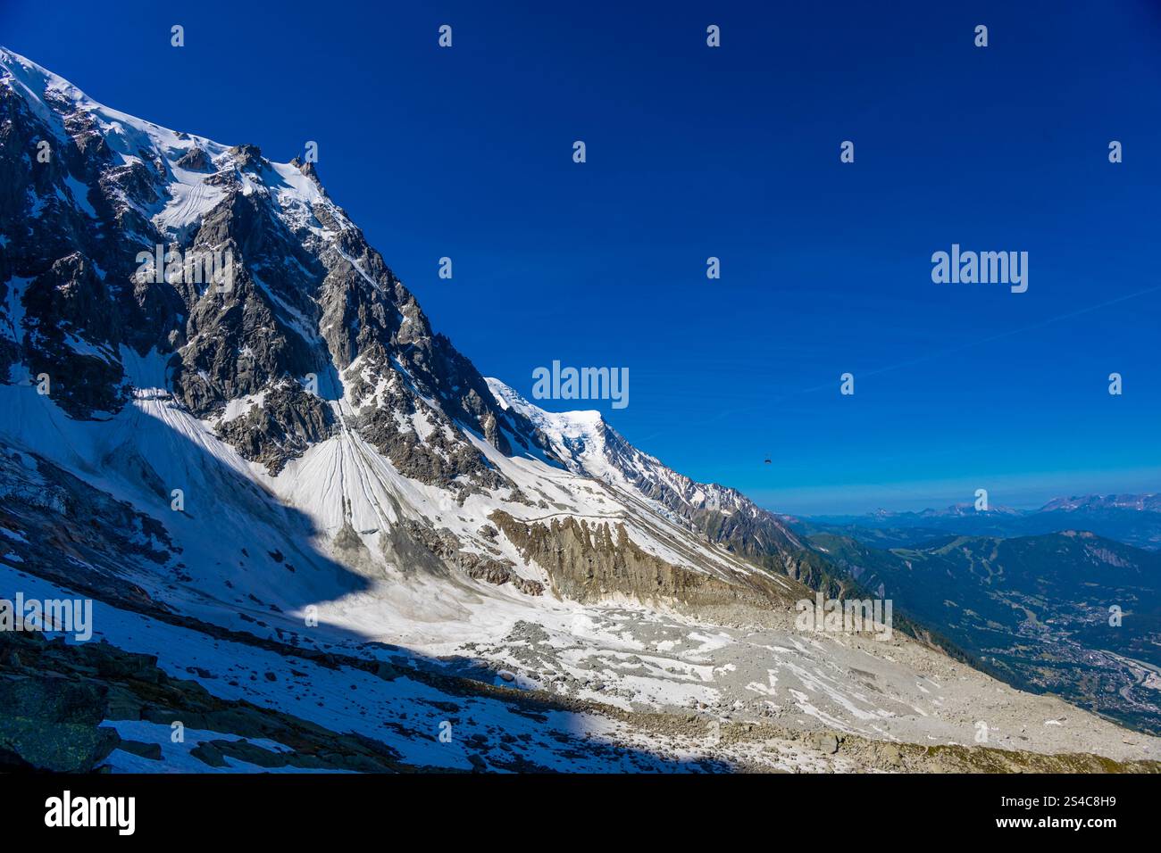 Snow mountain summits and white ice glacier in the Alps. Mont Blanc ...