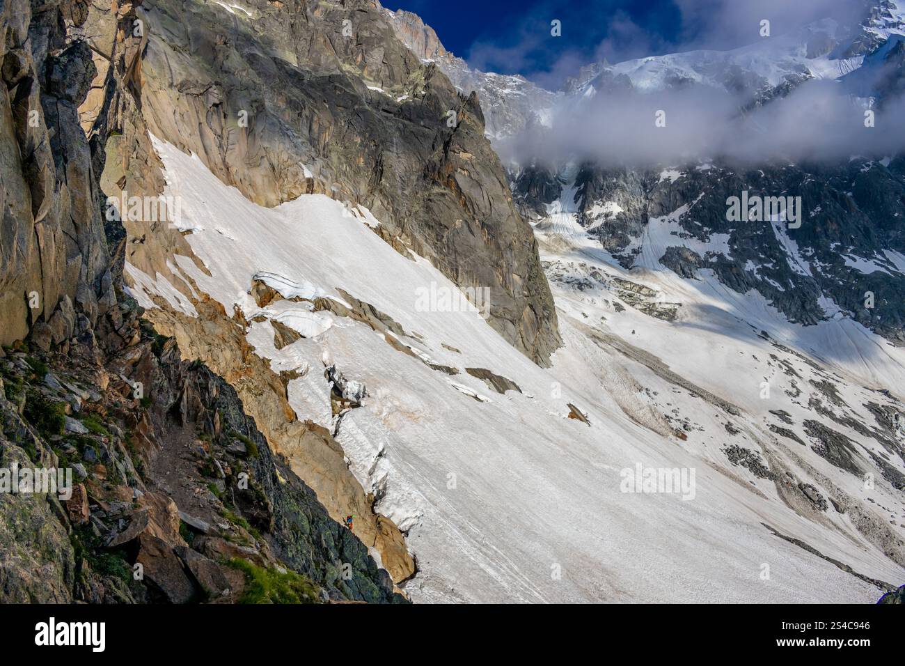 Snow mountain summits and white ice glacier in the Alps. Mont Blanc climbing route and views ...