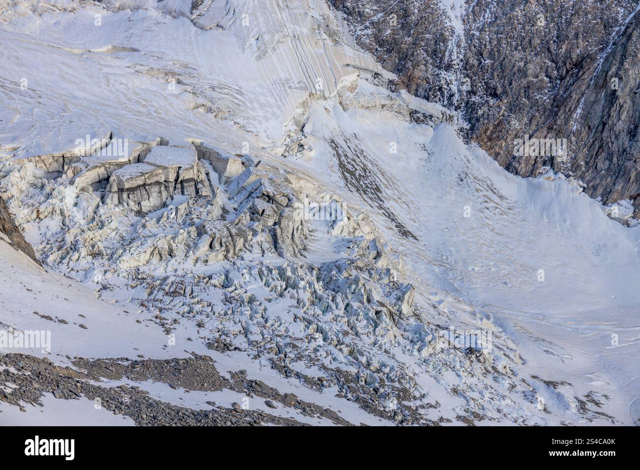 Snow mountain summits and white ice glacier in the Alps. Mont Blanc climbing route and views ...