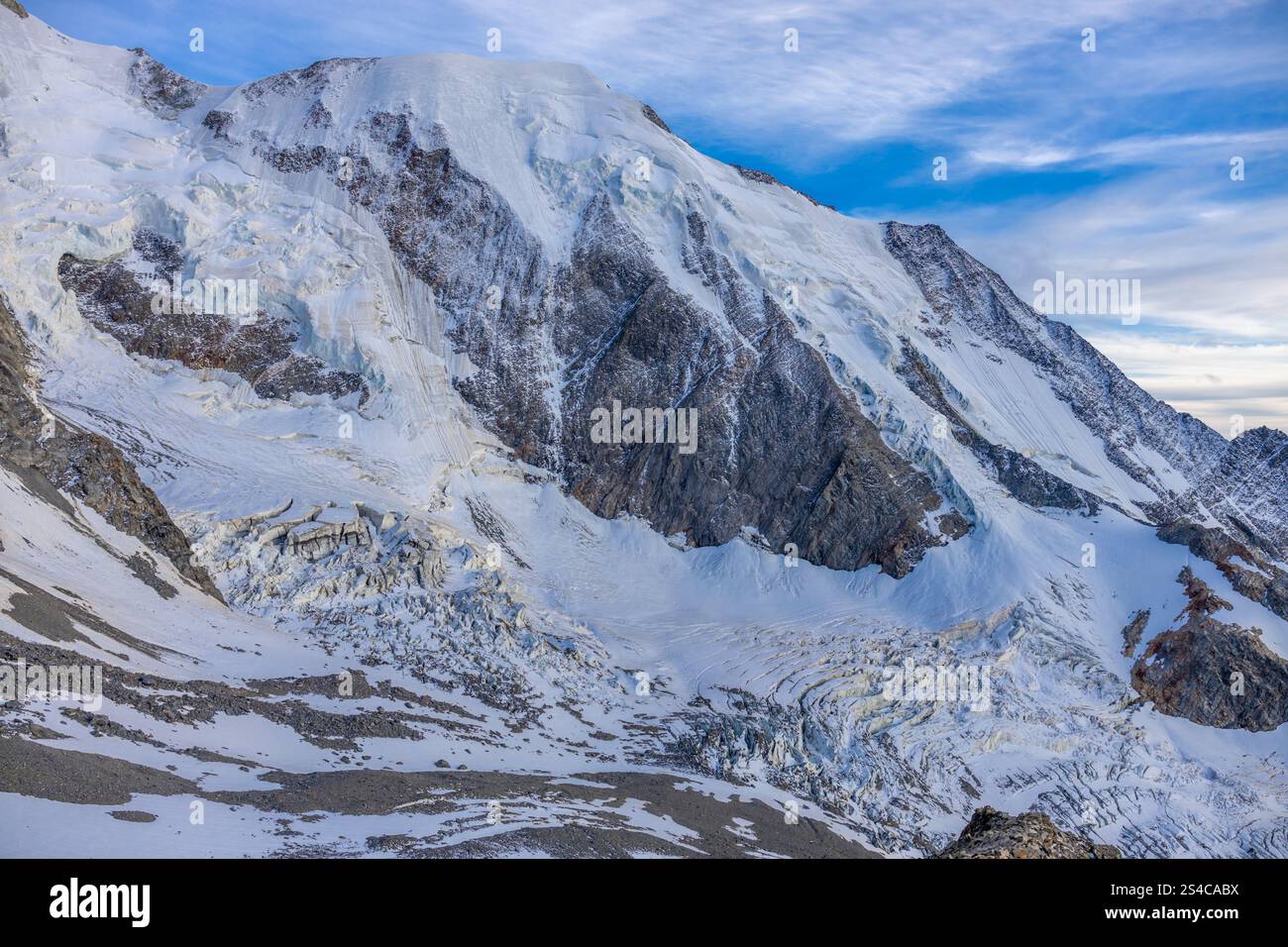 Snow mountain summits and white ice glacier in the Alps. Mont Blanc climbing route and views ...