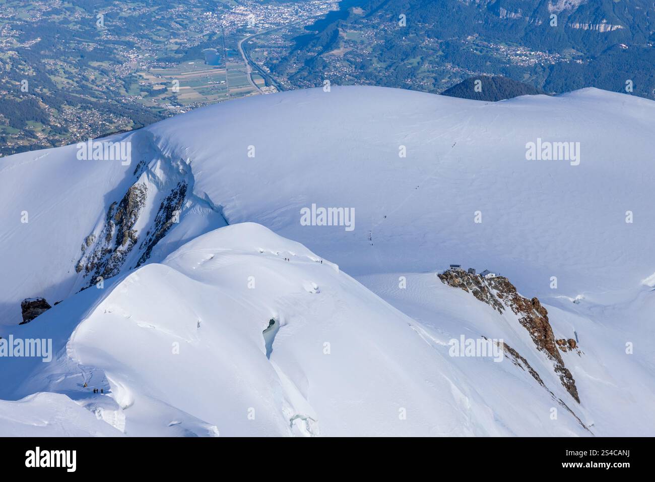 Snow mountain summits and white ice glacier in the Alps. Mont Blanc climbing route and views ...