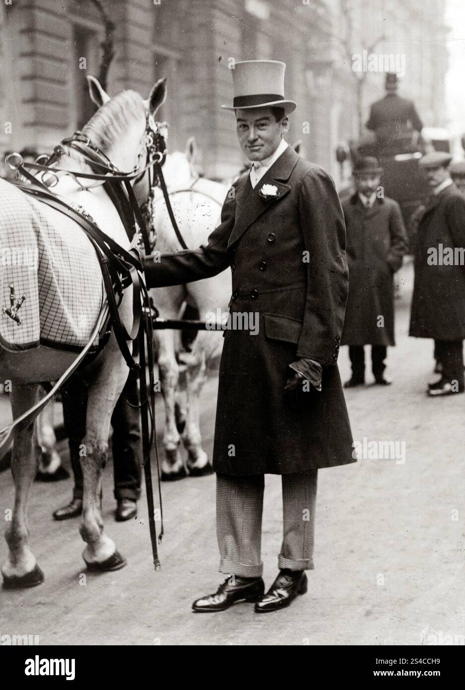 Portrait of American millionaire A.G. Vanderbilt wearing a top hat near ...