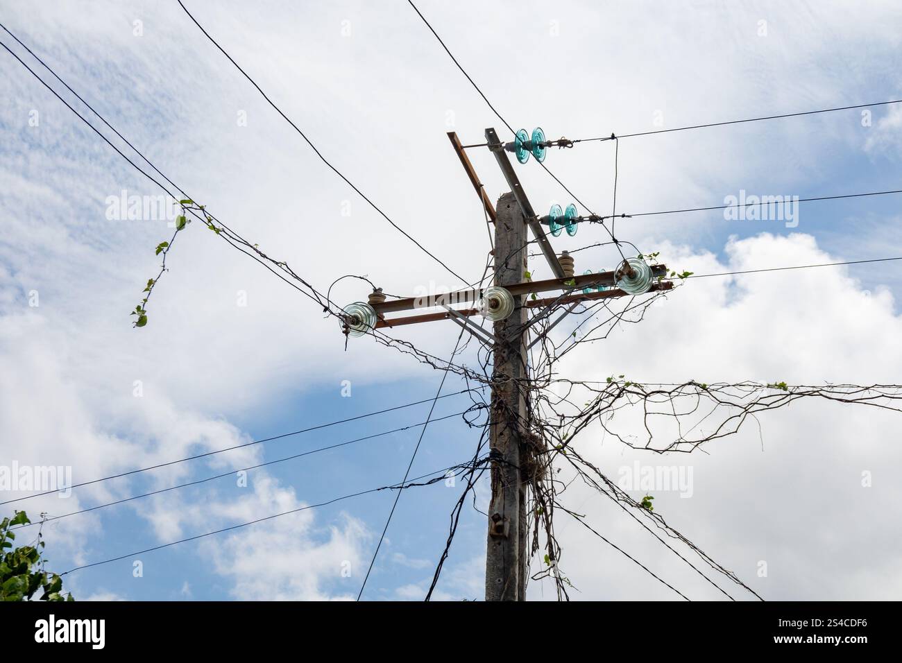 Electricity in Cuba, electrical pylon with messy wires and equipment ...