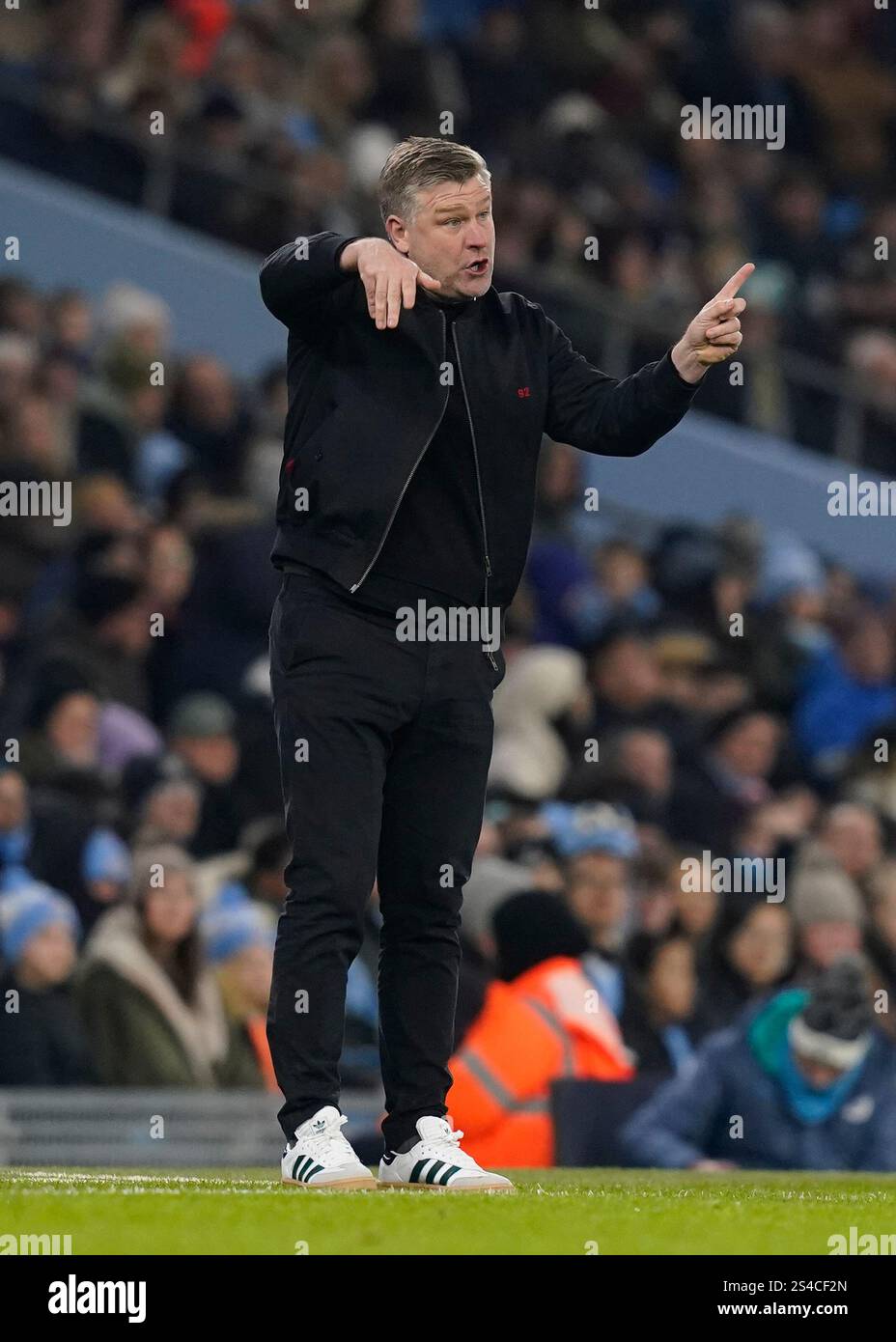 Manchester, UK. 11th Jan, 2025. Karl Robinson manager of Salford City ...