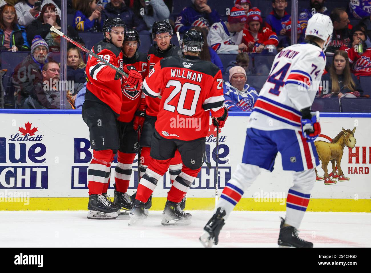 Rochester, New York, USA. 10th Jan, 2025. Utica Comets players celebrate a goal in the first ...