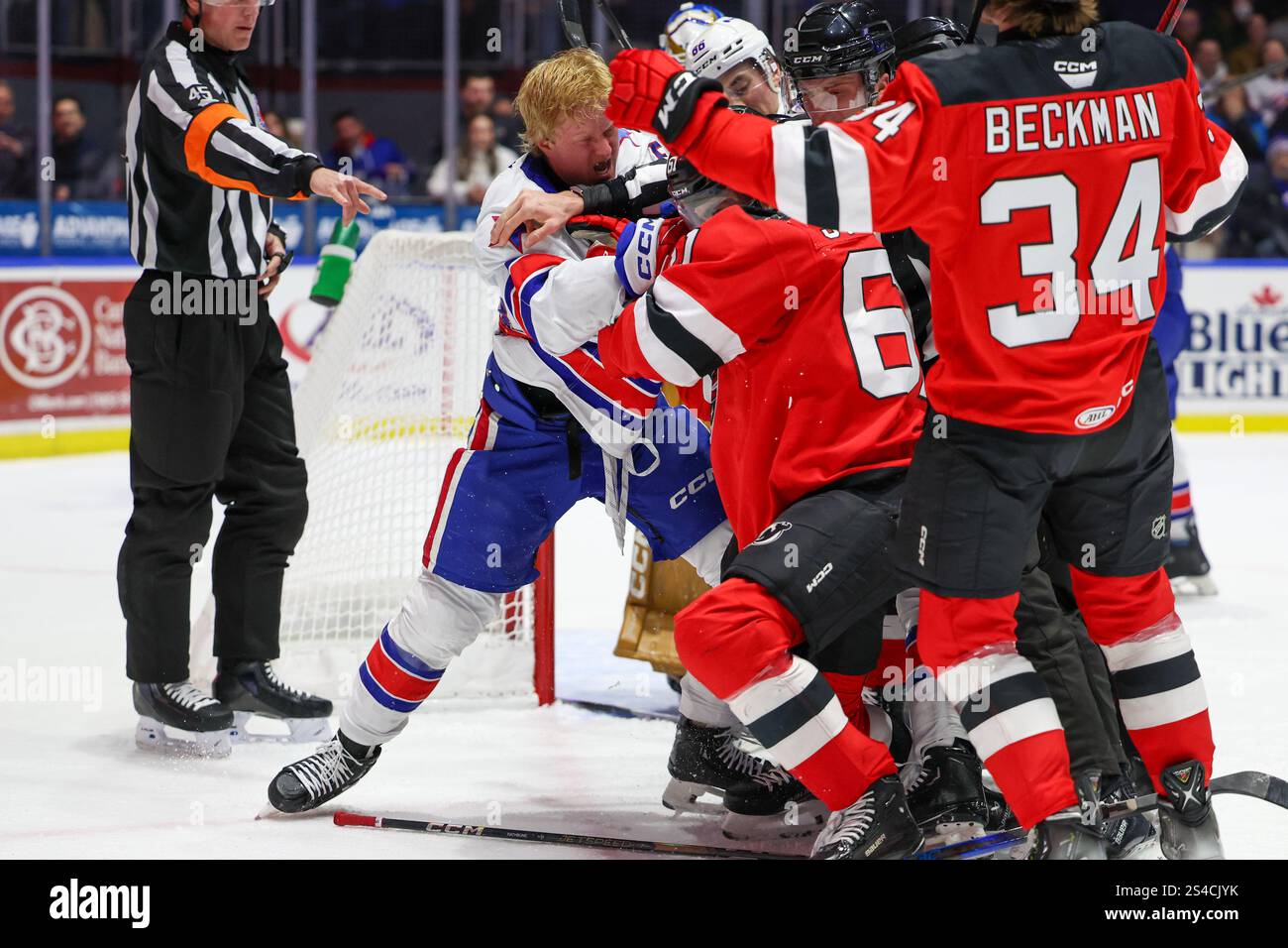 Rochester, New York, USA. 10th Jan, 2025. Utica Comets forward Chase Stillman (61) and Rochester ...