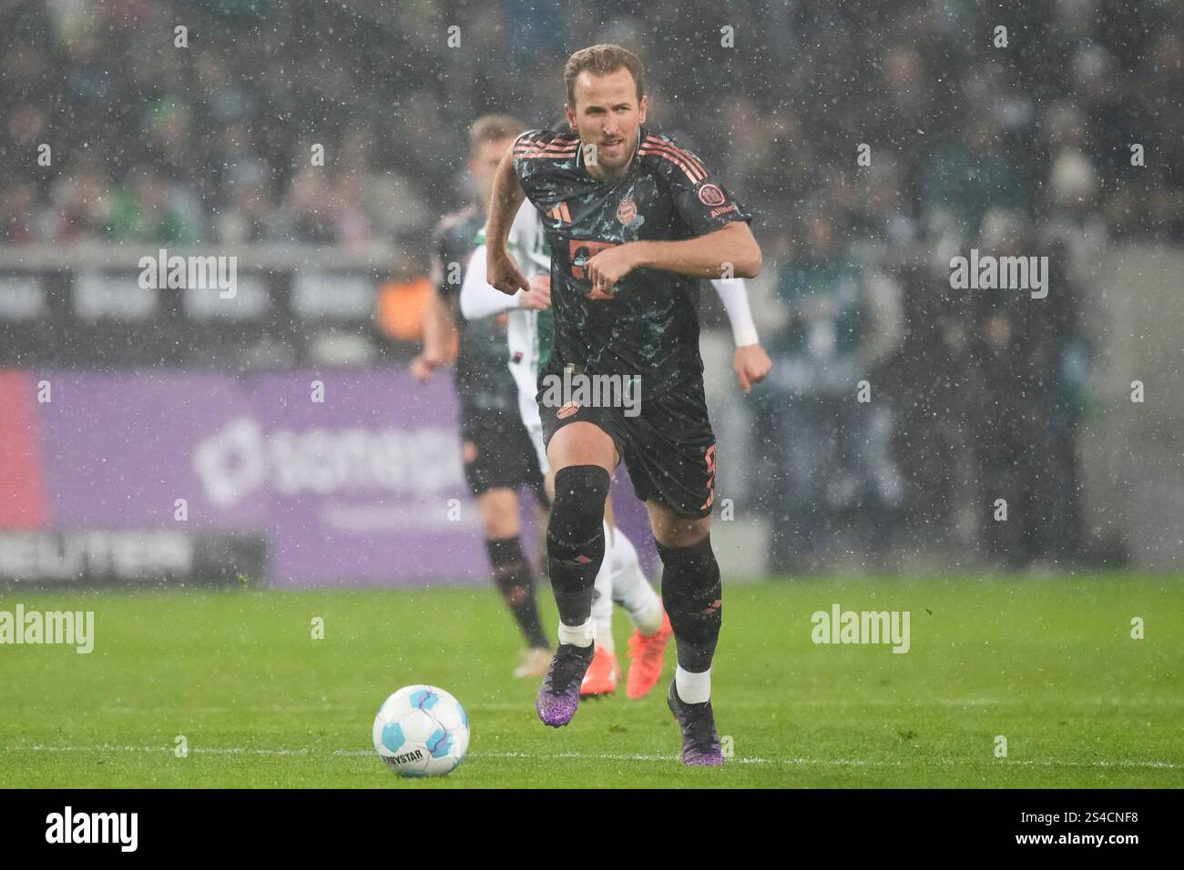 Bayern's Harry Kane controls the ball during the German Bundesliga ...