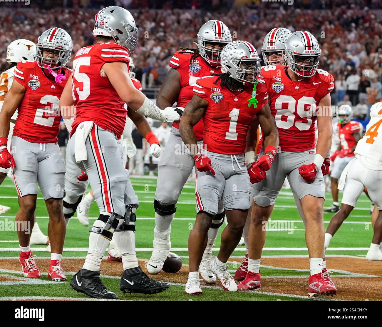 Arlington, Texas, USA. 10th Jan, 2025. Teammates celebrate with Ohio ...