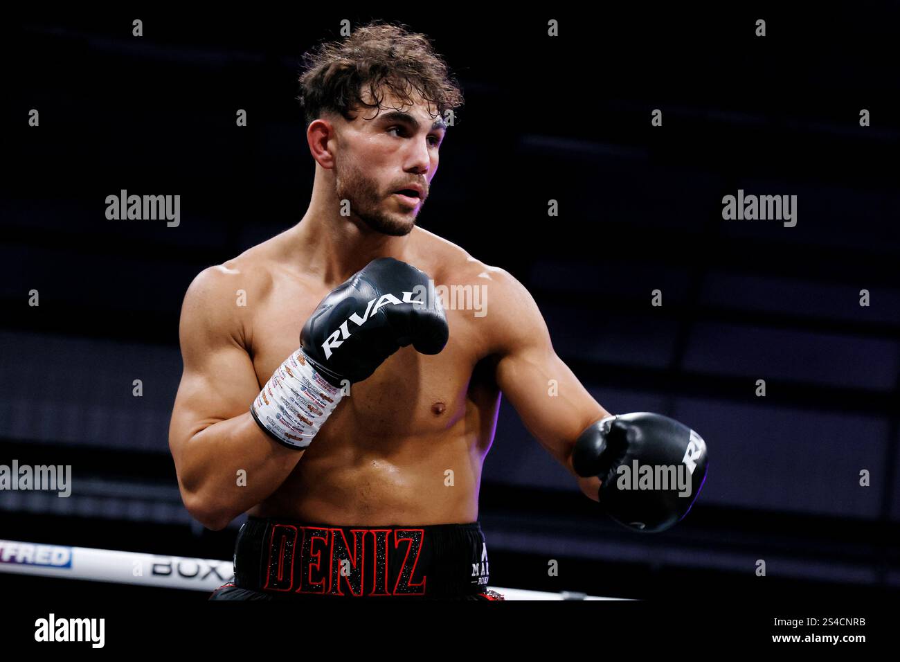 Billy Deniz during the Light Heavyweight contest against Mickey Ellison ...