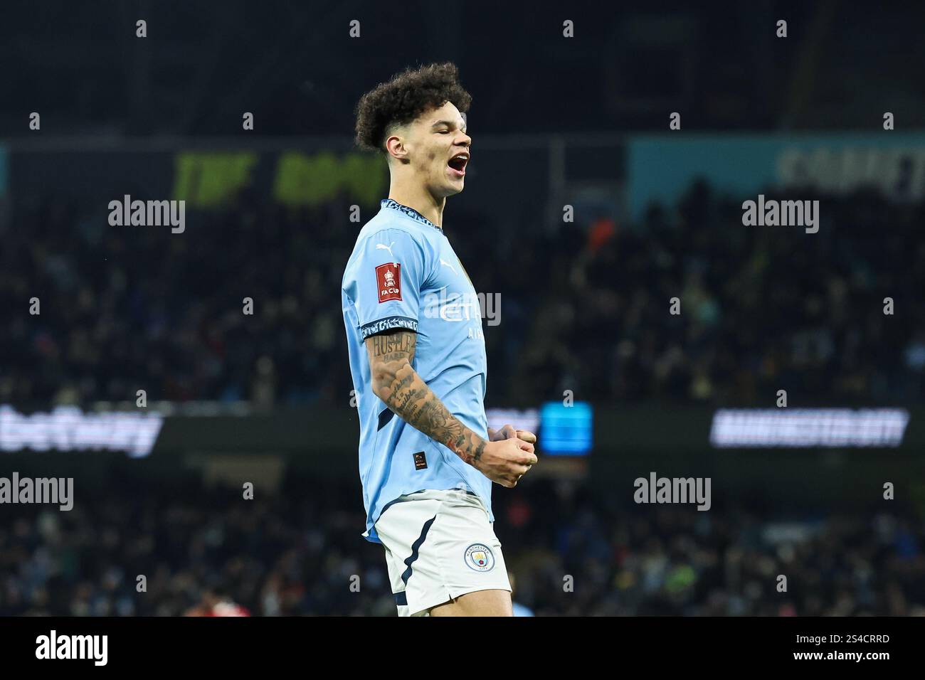 Nico O'Reilly of Manchester City celebrates his goal to make it during ...