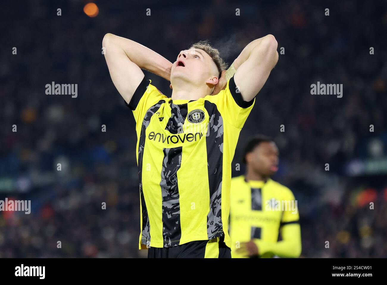 Harrogate Town's Toby Sims reacts after missing an opportunity on goal ...
