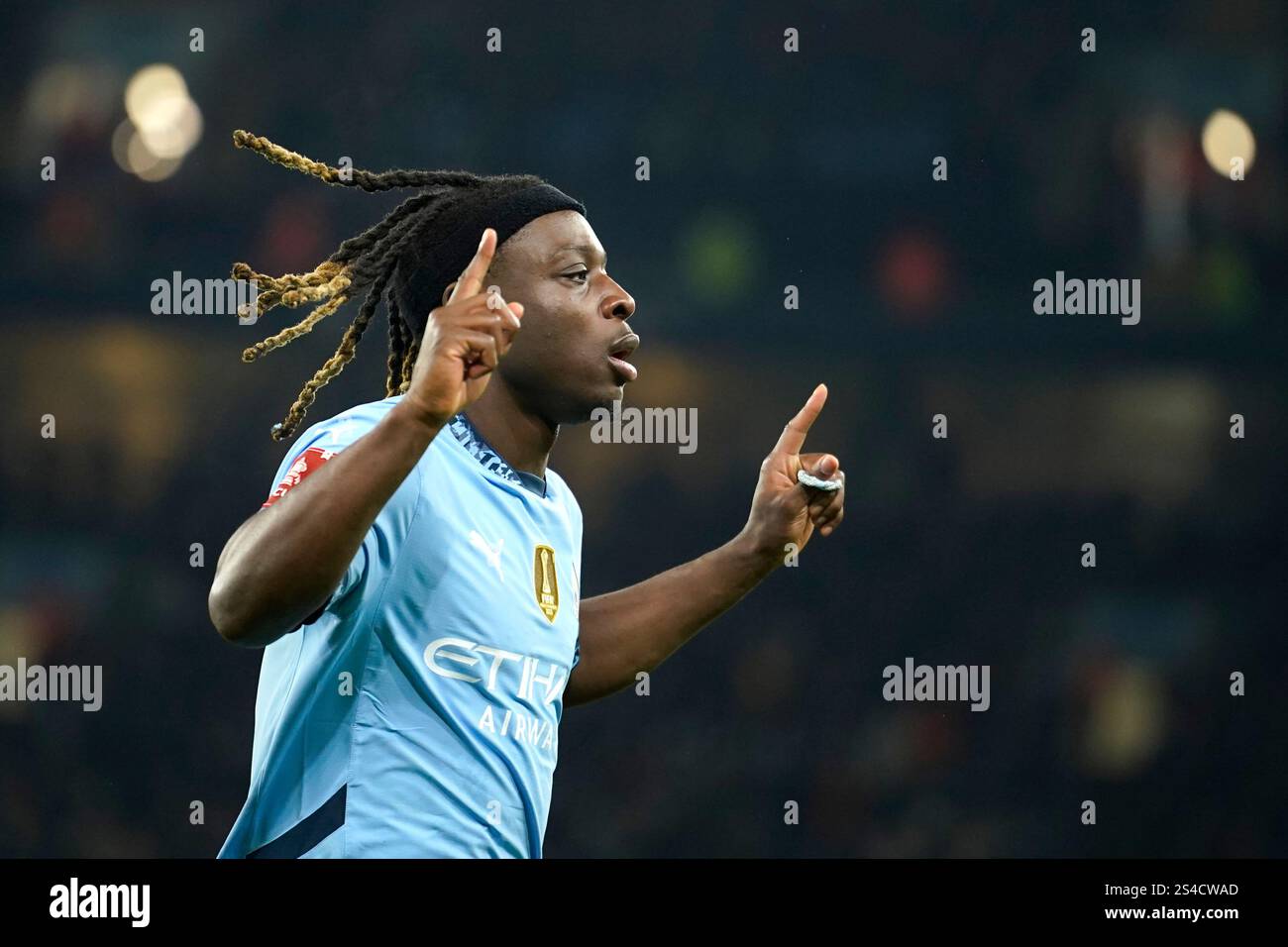 Manchester City's Jeremy Doku celebrates after scoring during the ...