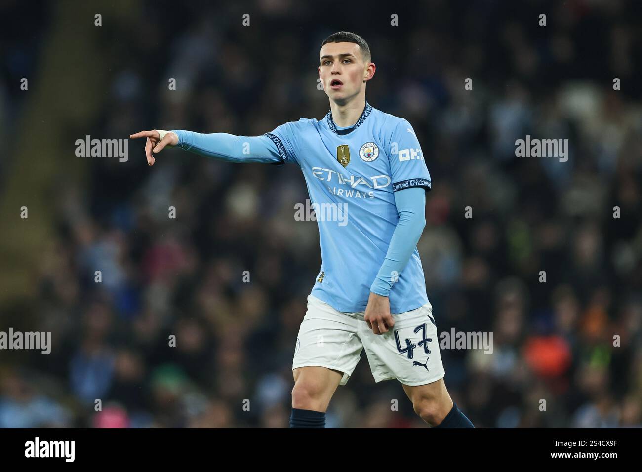 Phil Foden of Manchester City gives his team instructions during the ...