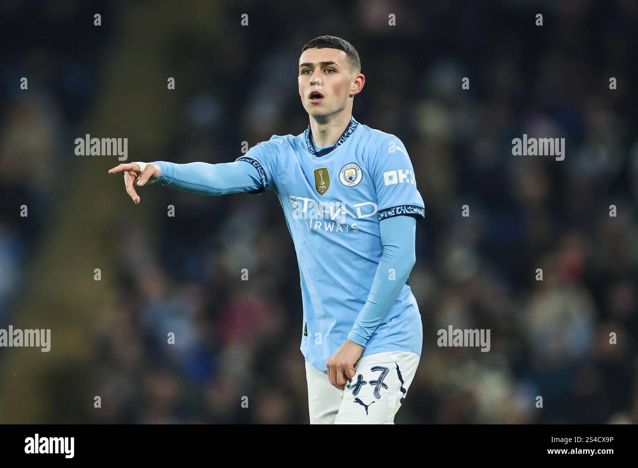 Phil Foden of Manchester City gives his team instructions during the ...