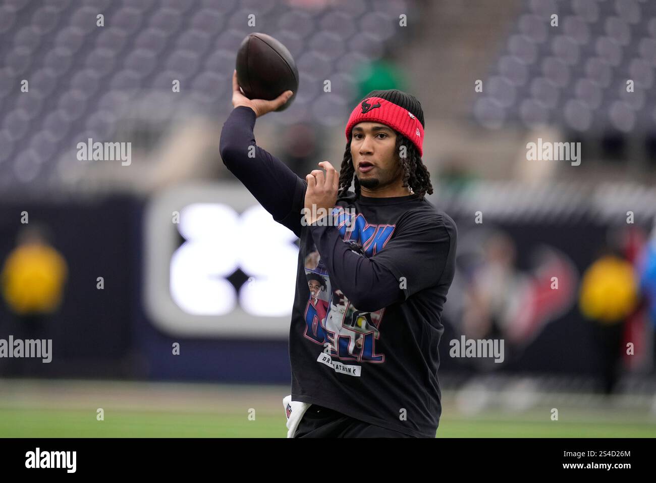 Houston Texans quarterback C.J. Stroud warms up before an NFL wild-card ...