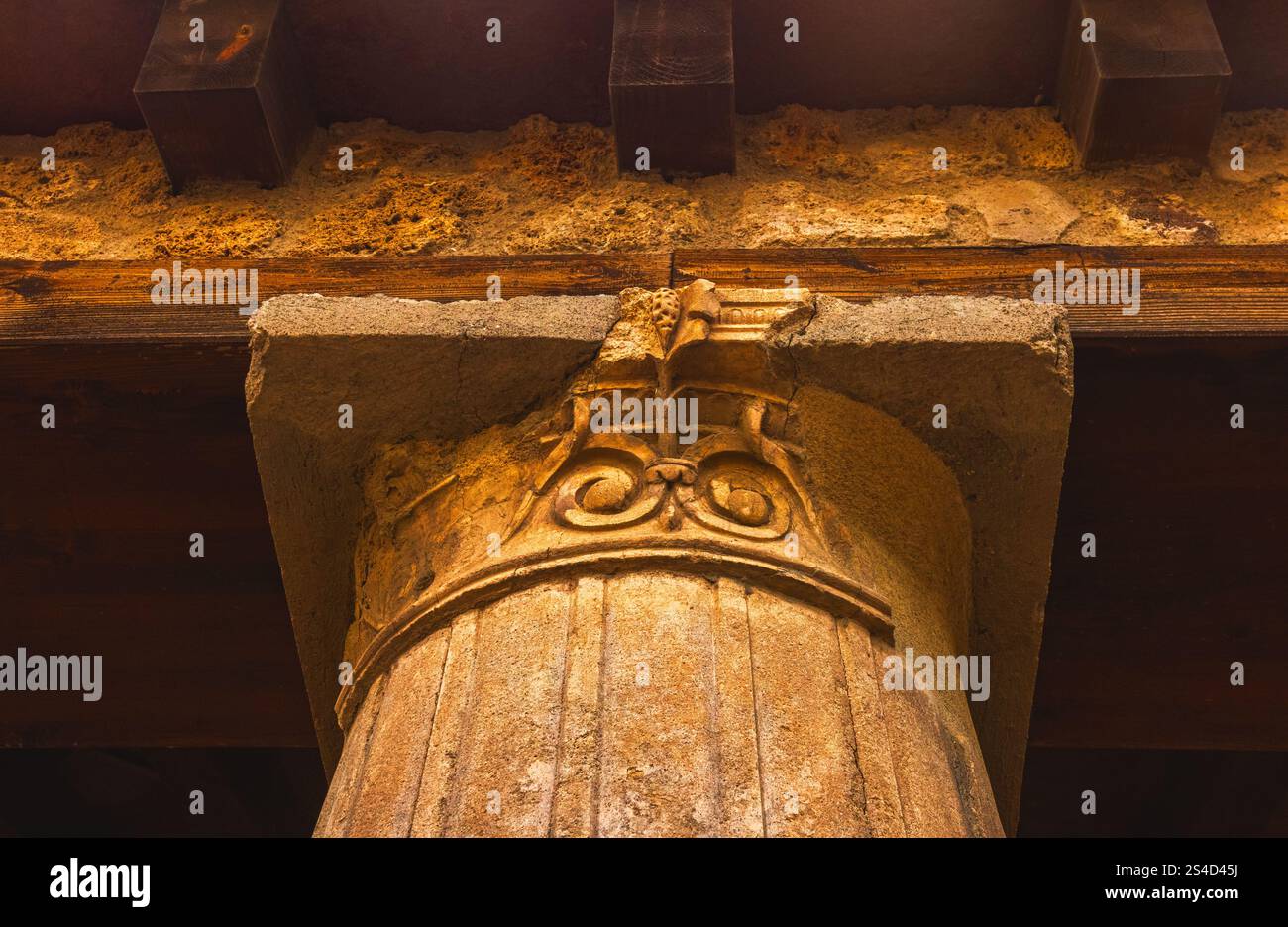 An ancient architectural column detail featuring an intricate and ...