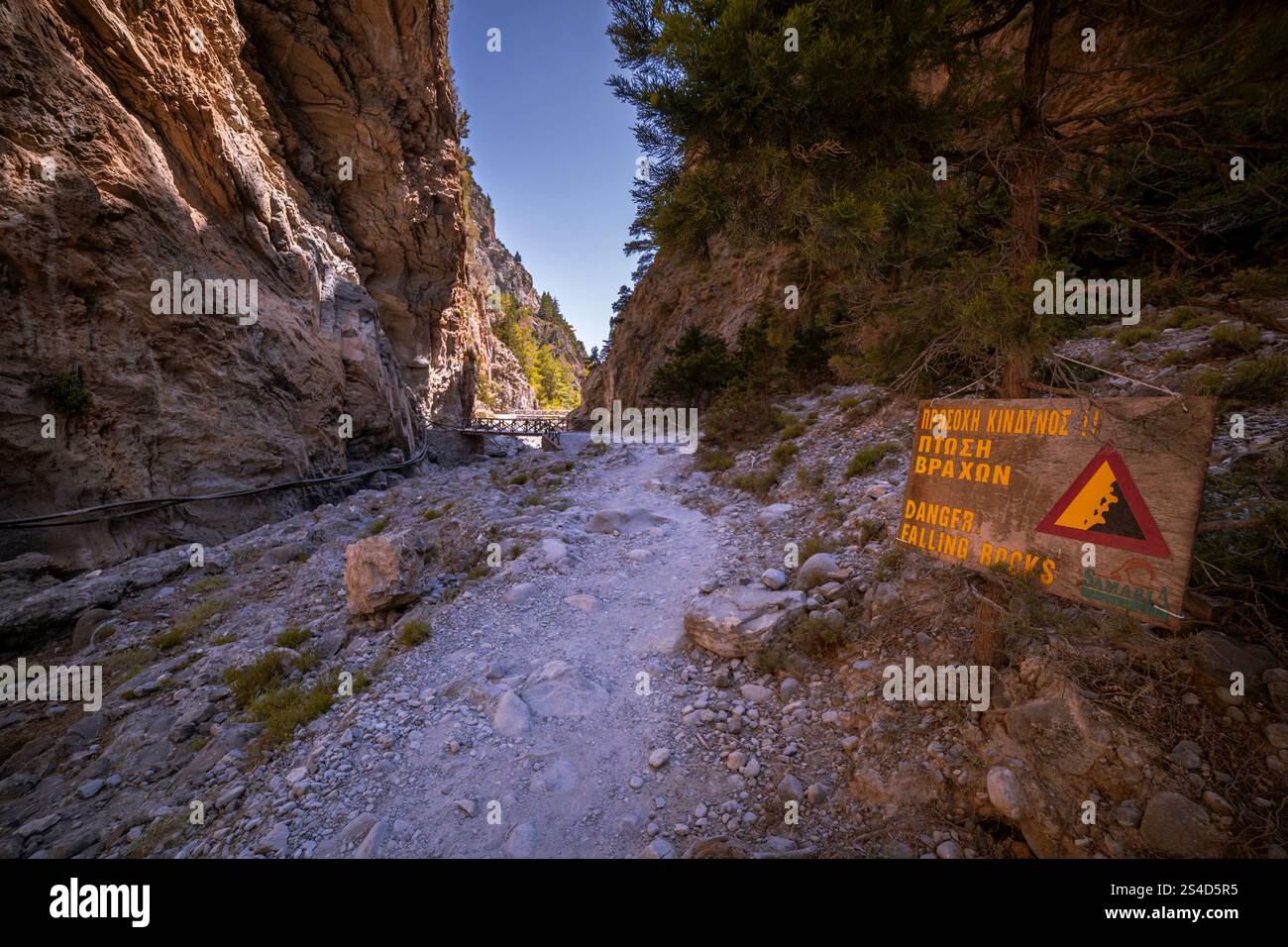 A gorge with a warning sign about the danger of falling stones Stock ...