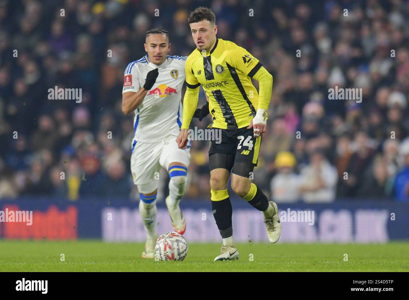Harrogate Town's Josh March goes on the attack during the Emirates FA ...
