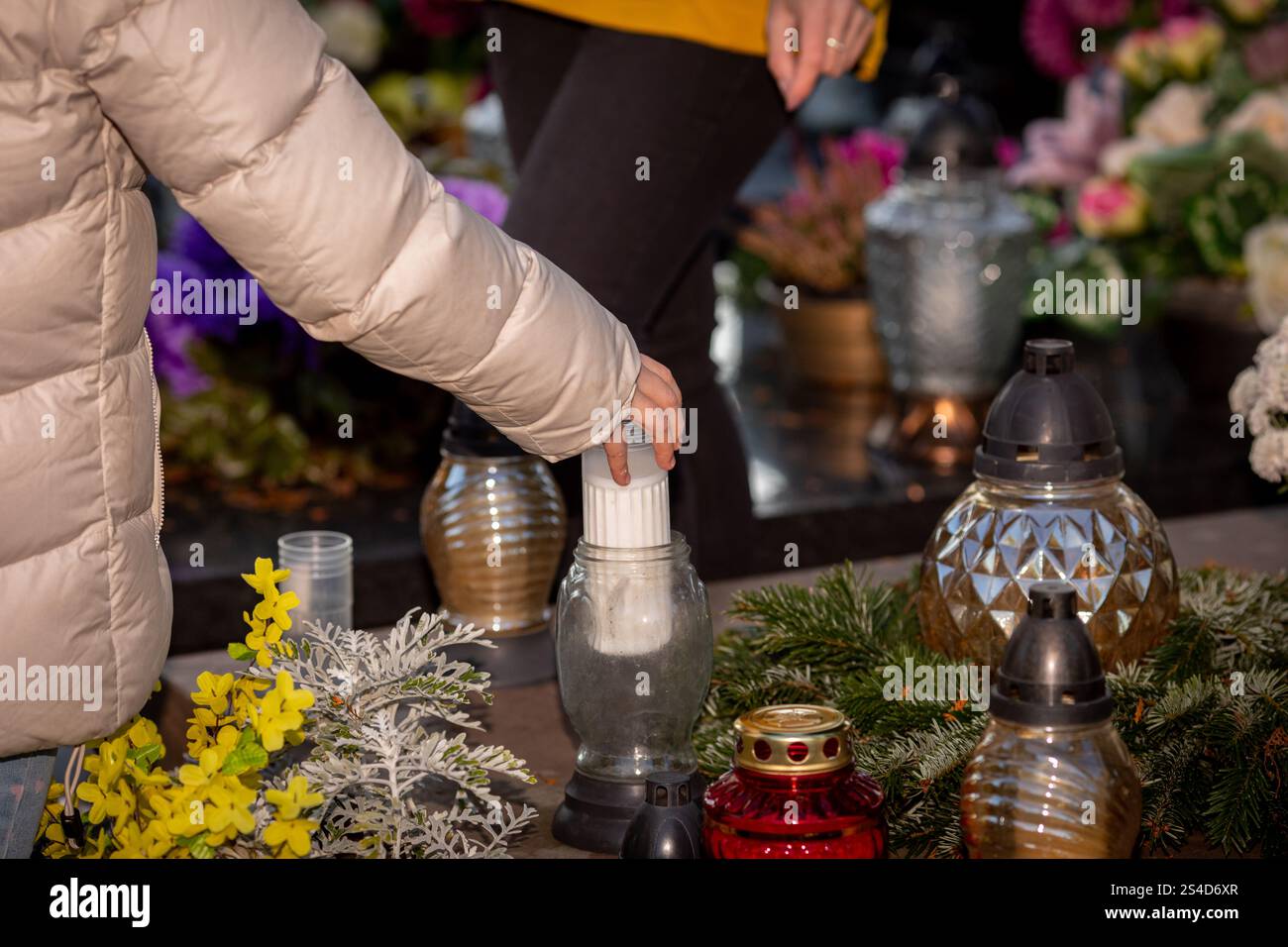 Lighting a Candle at a Cemetery during the Time of Remembrance and ...