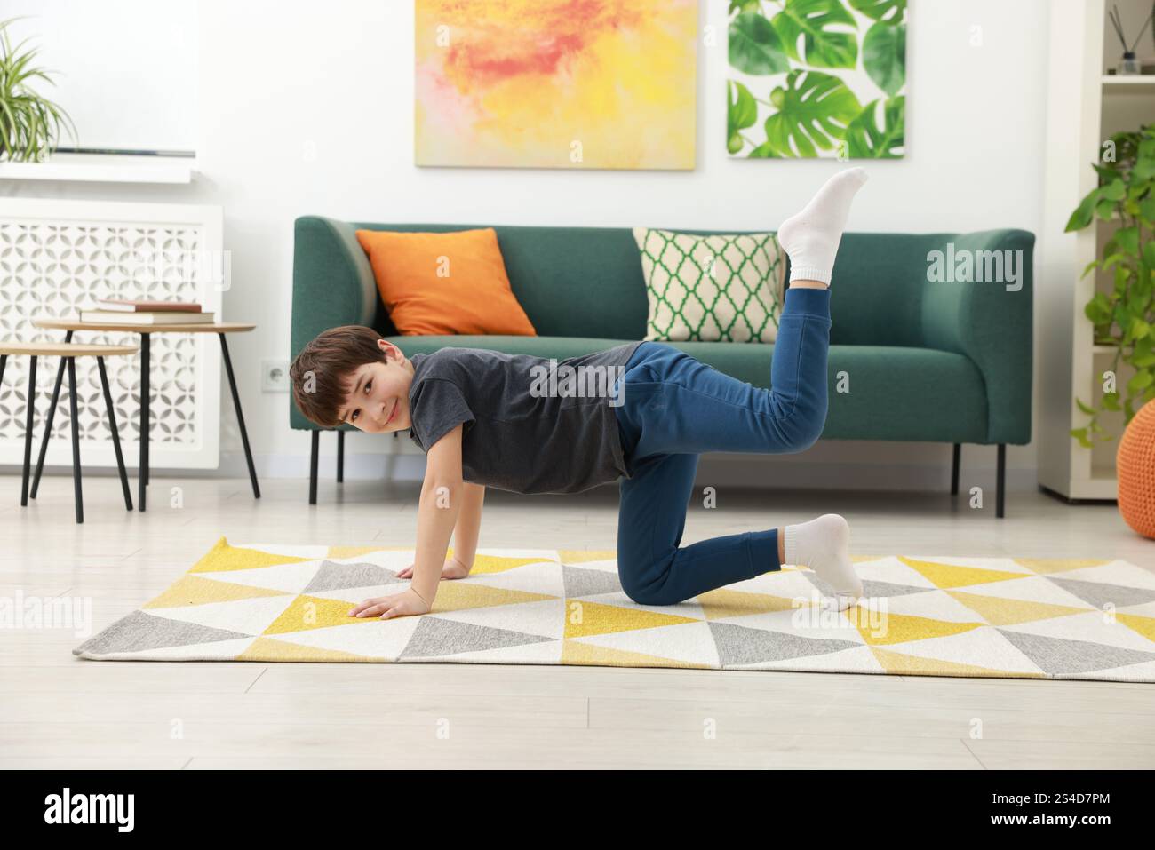 Exercise boy stretching hi-res stock photography and images - Alamy