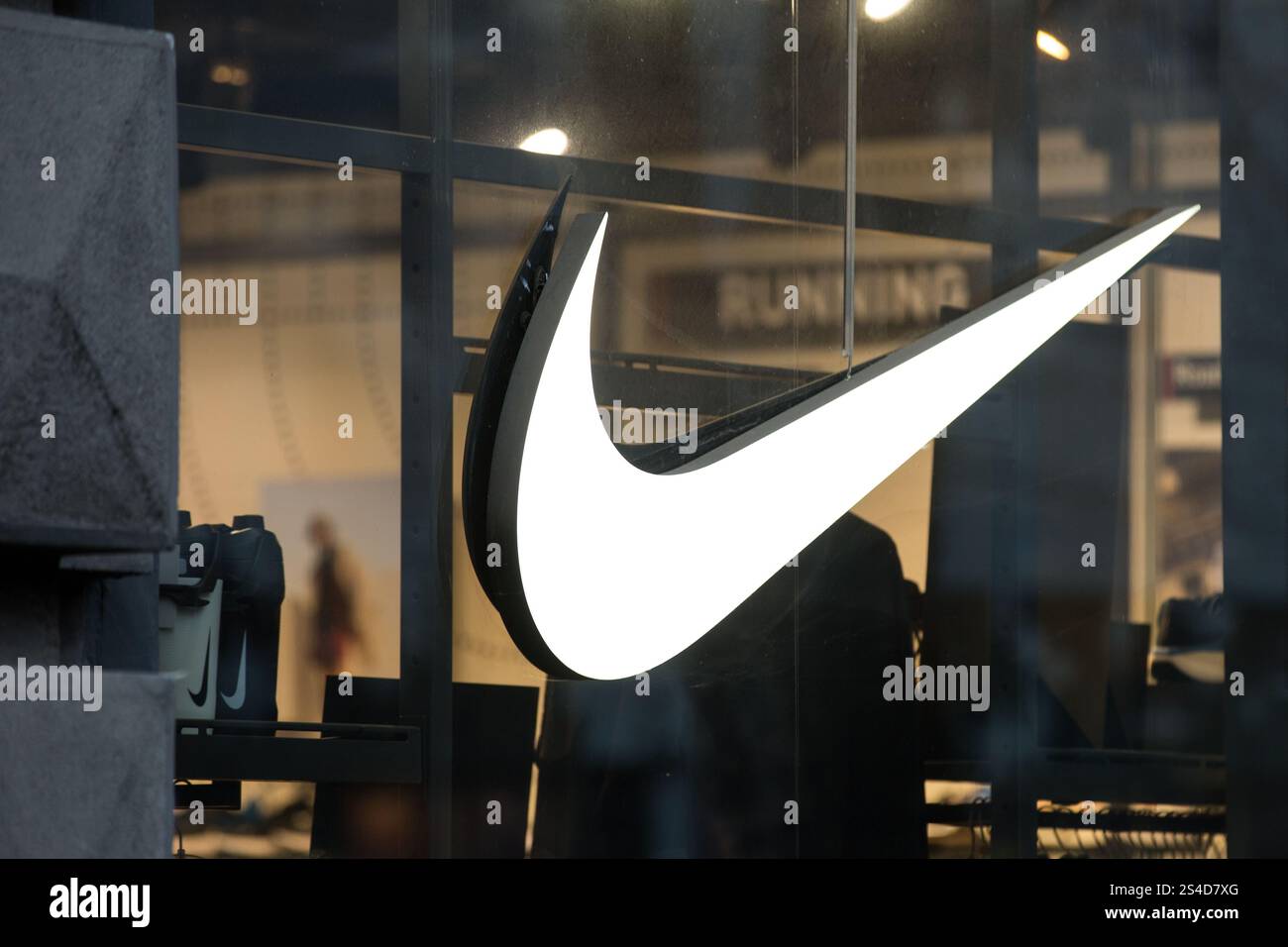 Nike logo is seen on a window store on Rustaveli Avenue in Tbilisi ...