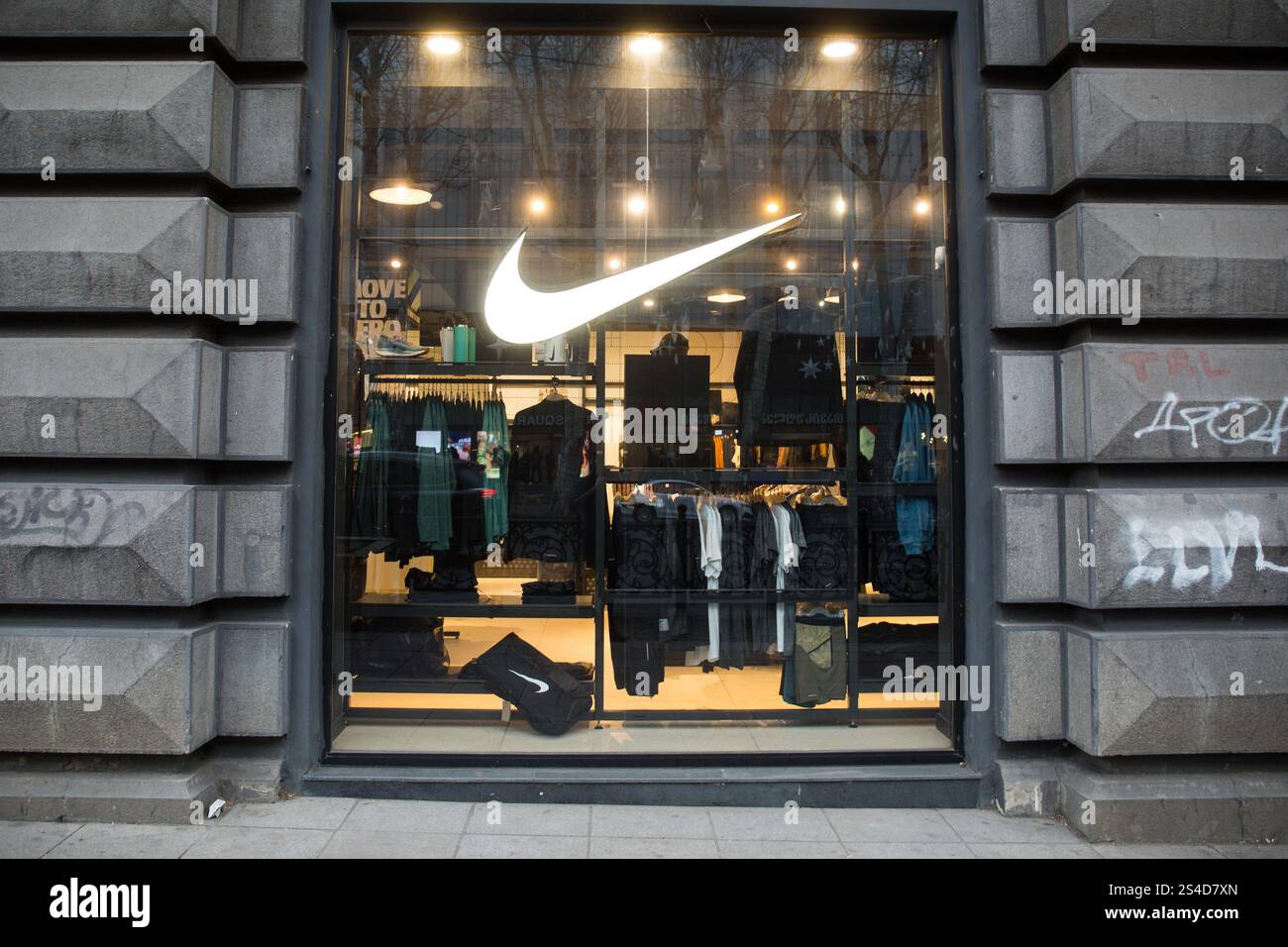 Nike logo is seen on a window store on Rustaveli Avenue in Tbilisi ...