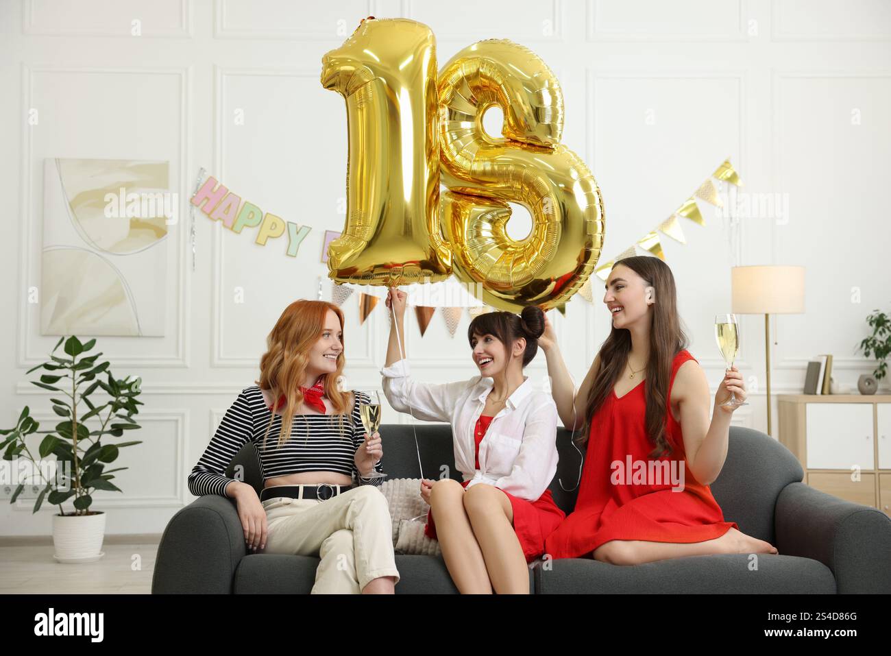 Coming of age party - 18th birthday. Group of young women celebrating ...