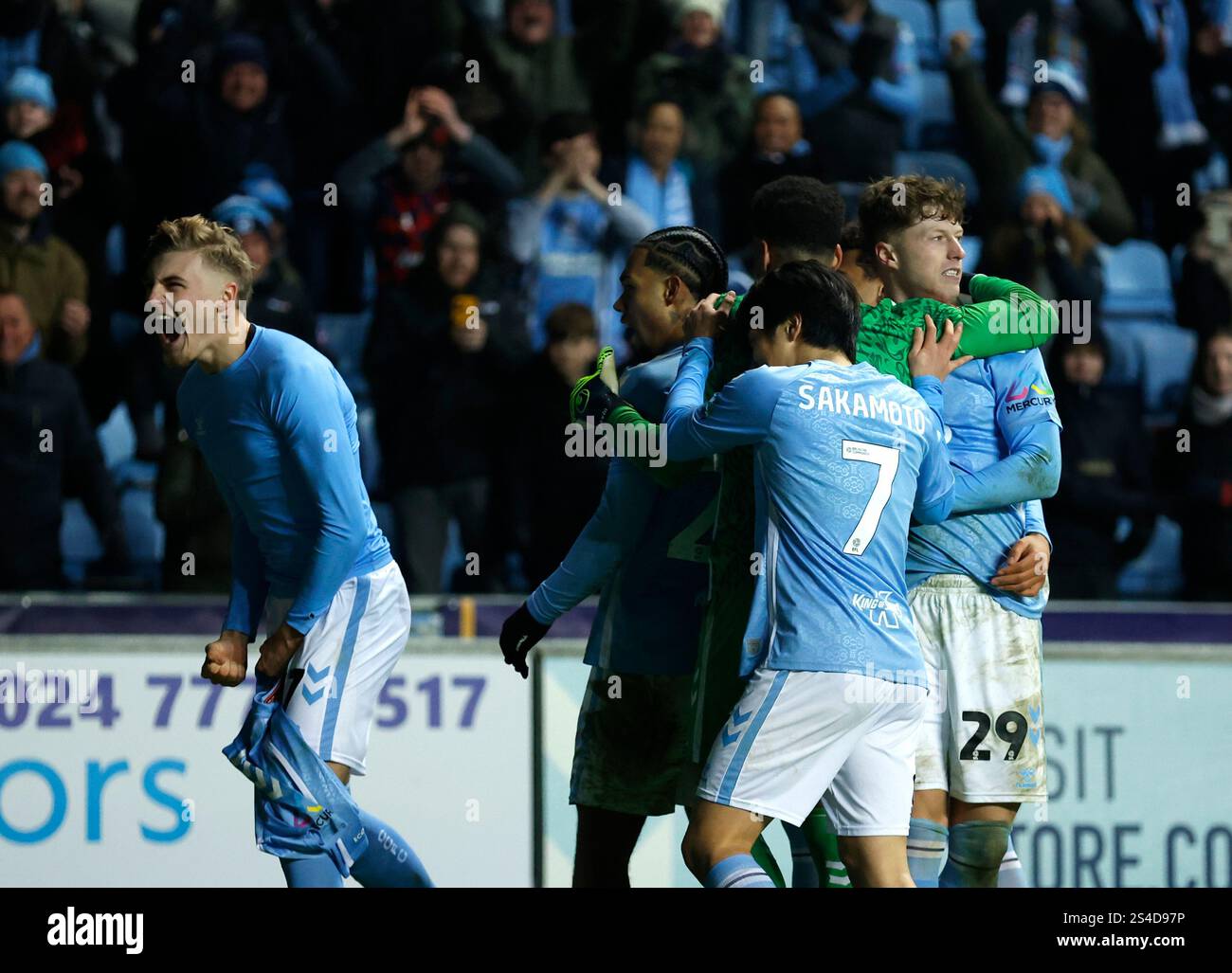 Coventry City goalkeeper Oliver Dovin celebrates victory in the penalty ...
