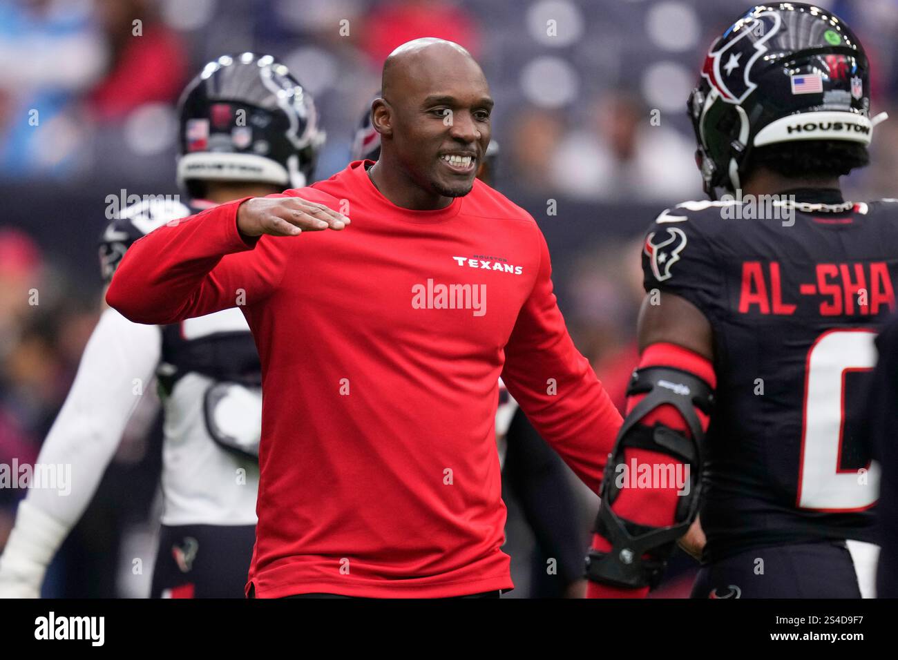 Houston Texans coach DeMeco Ryans, left, greets linebacker Azeez Al ...