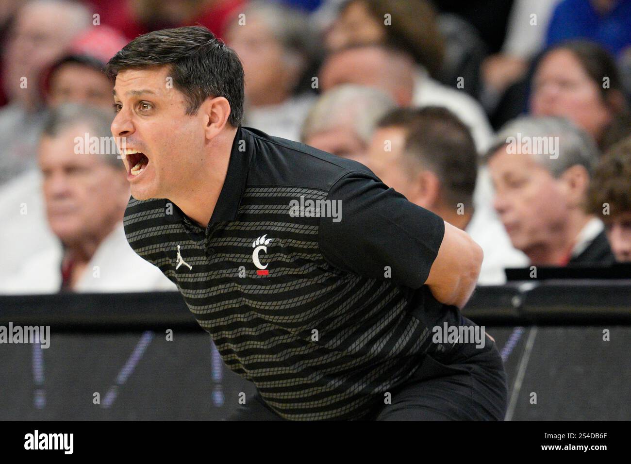 Cincinnati head coach Wes Miller reacts during the first half of an ...