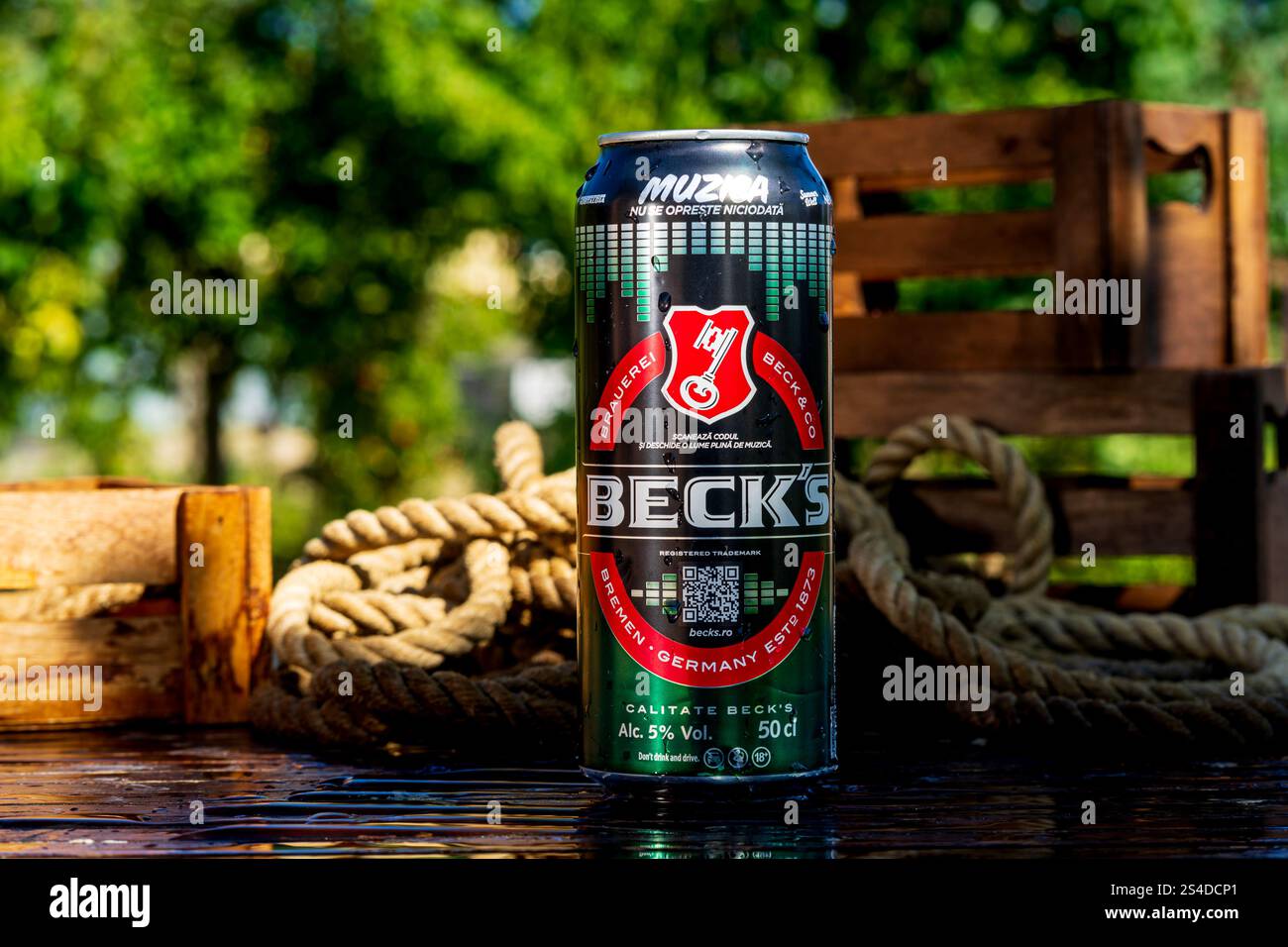 Beck's beer can - condensation water droplets, outdoors background ...