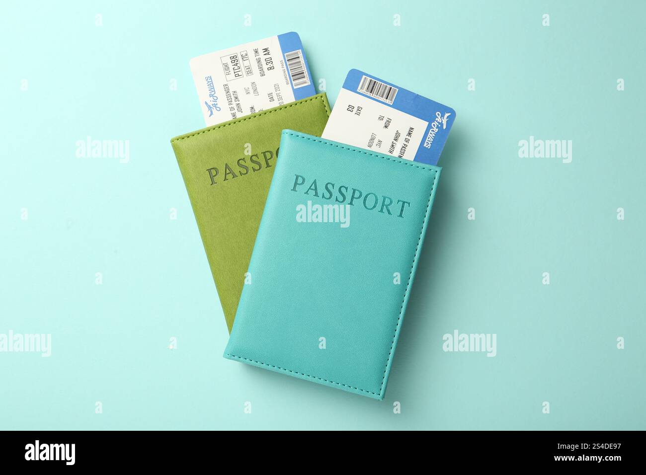 Passports with tickets on light blue background, top view Stock Photo ...