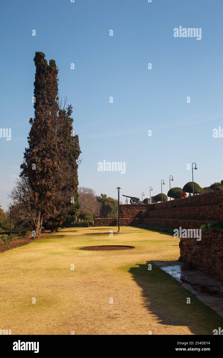 A Cypress tree and the terraced Union Buildings Gardens, Pretoria ...