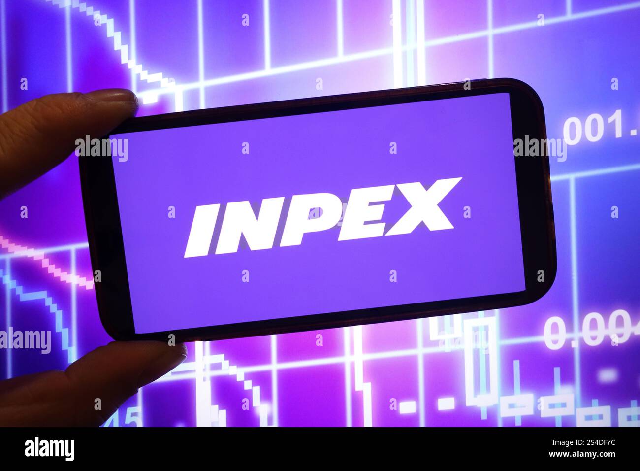 In this photo illustration, the Inpex company logo is seen displayed on a smartphone screen ...