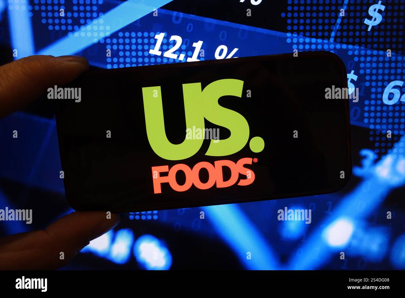 In this photo illustration, the US Foods company logo is seen displayed ...