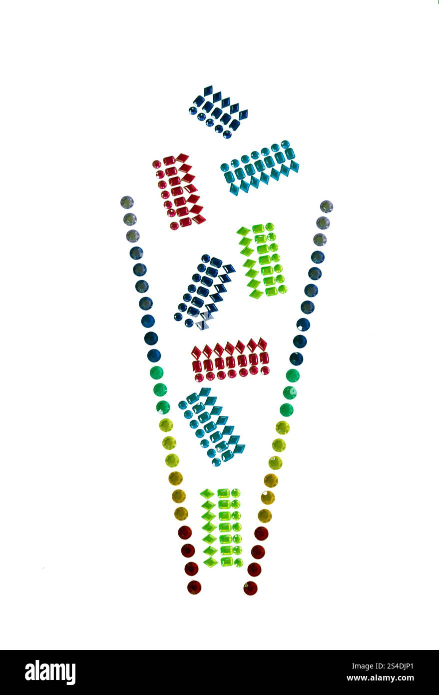Rhinestone collage shows colors forming a tube, cup, container ...