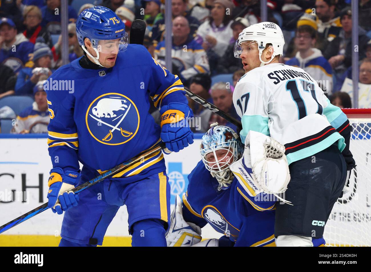 Buffalo Sabres defenseman Connor Clifton (75) and Seattle Kraken center ...