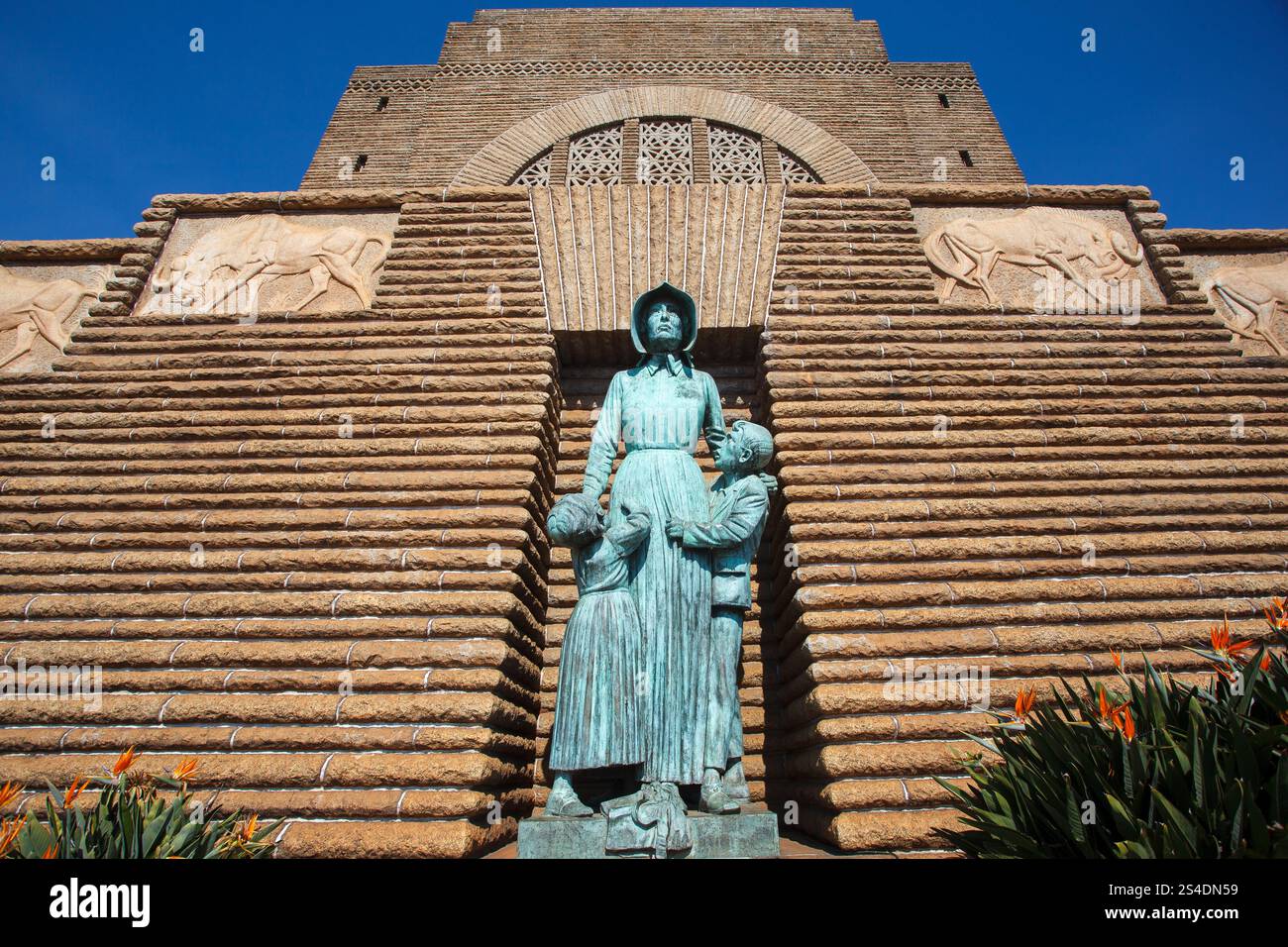 The Pioneer woman bronze statue with two children at the Voortrekker ...