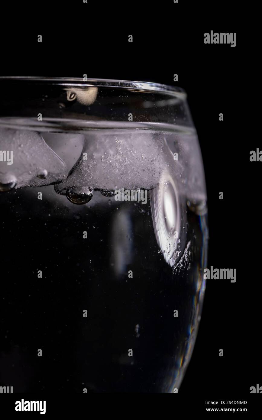 glass with cold sparkling water, cold mineral water with a lot of gases and bubbles Stock Photo ...